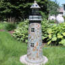 Longshore Tides Caulkins Decorative Cobblestone Solar Resin Lighthouse with LED Lights & Reviews ...